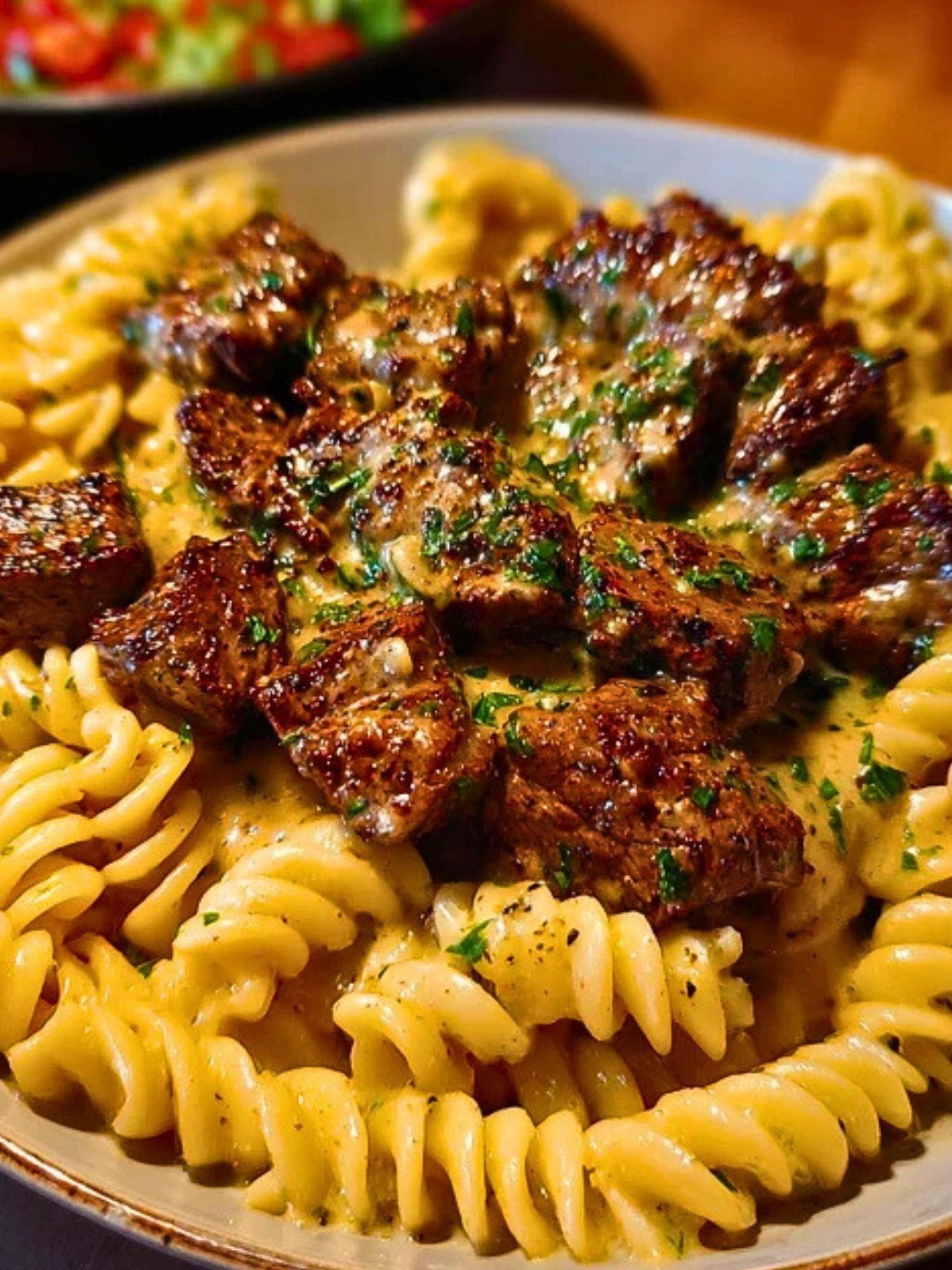 Steak Bites in Garlic Parmesan Sauce over Rotini